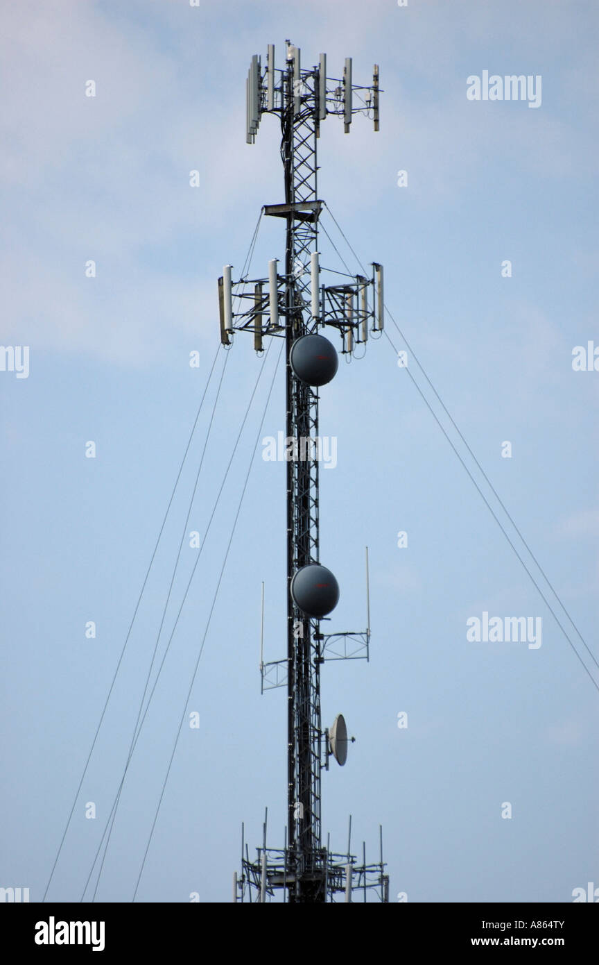 Communication tower with various antennas for sending and receiving ...