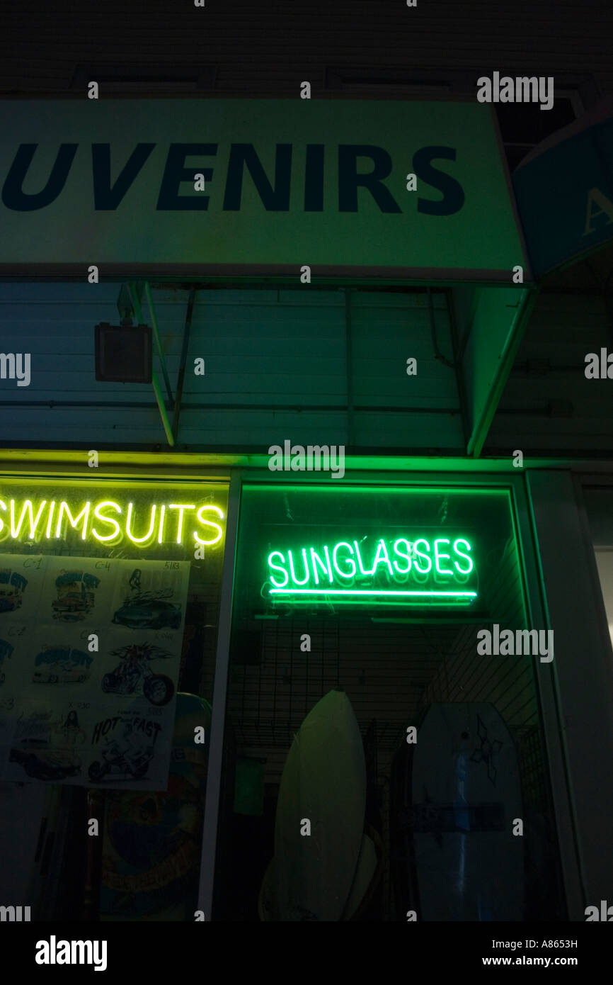 An evening in front of a storefront at the beach Stock Photo - Alamy