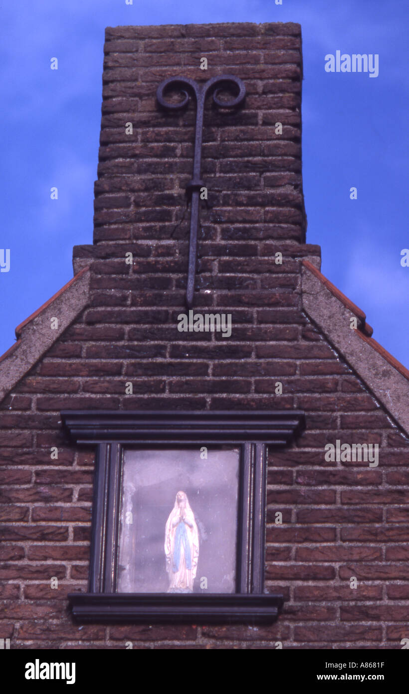 Volendam shrine to Our Lady in house front Stock Photo - Alamy