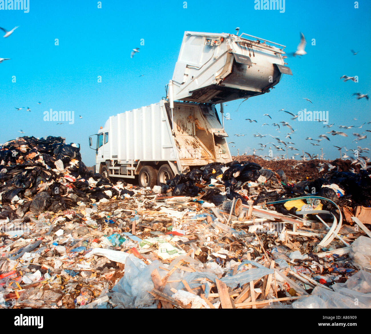 Garbage truck at landfill hi-res stock photography and images - Alamy