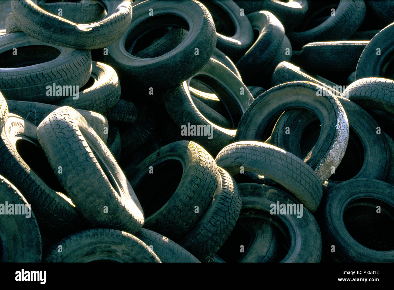Pile of waste car tyres Stock Photo - Alamy