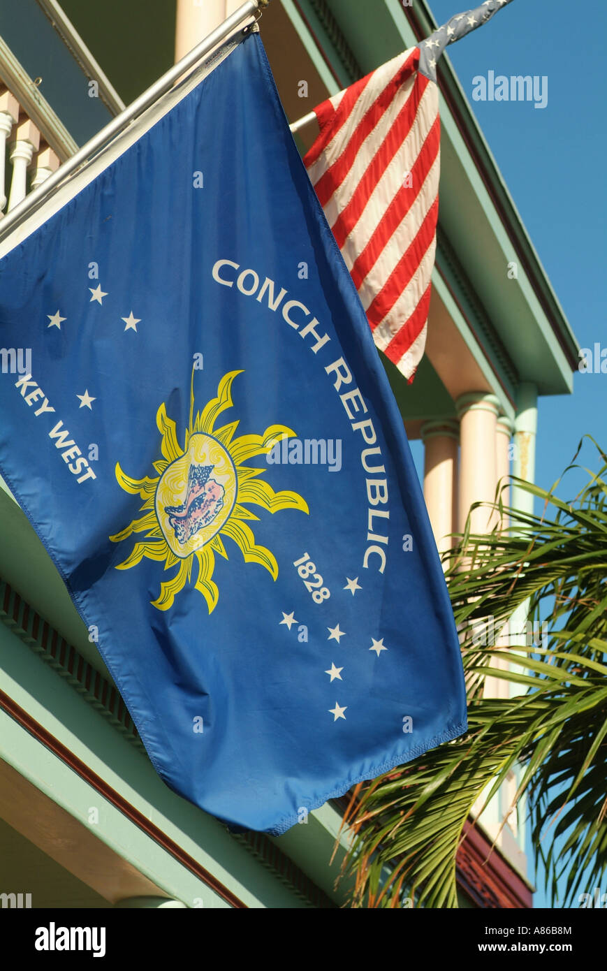 A Conch Republic flag hangs outside the Southernmost House and Hotel ...