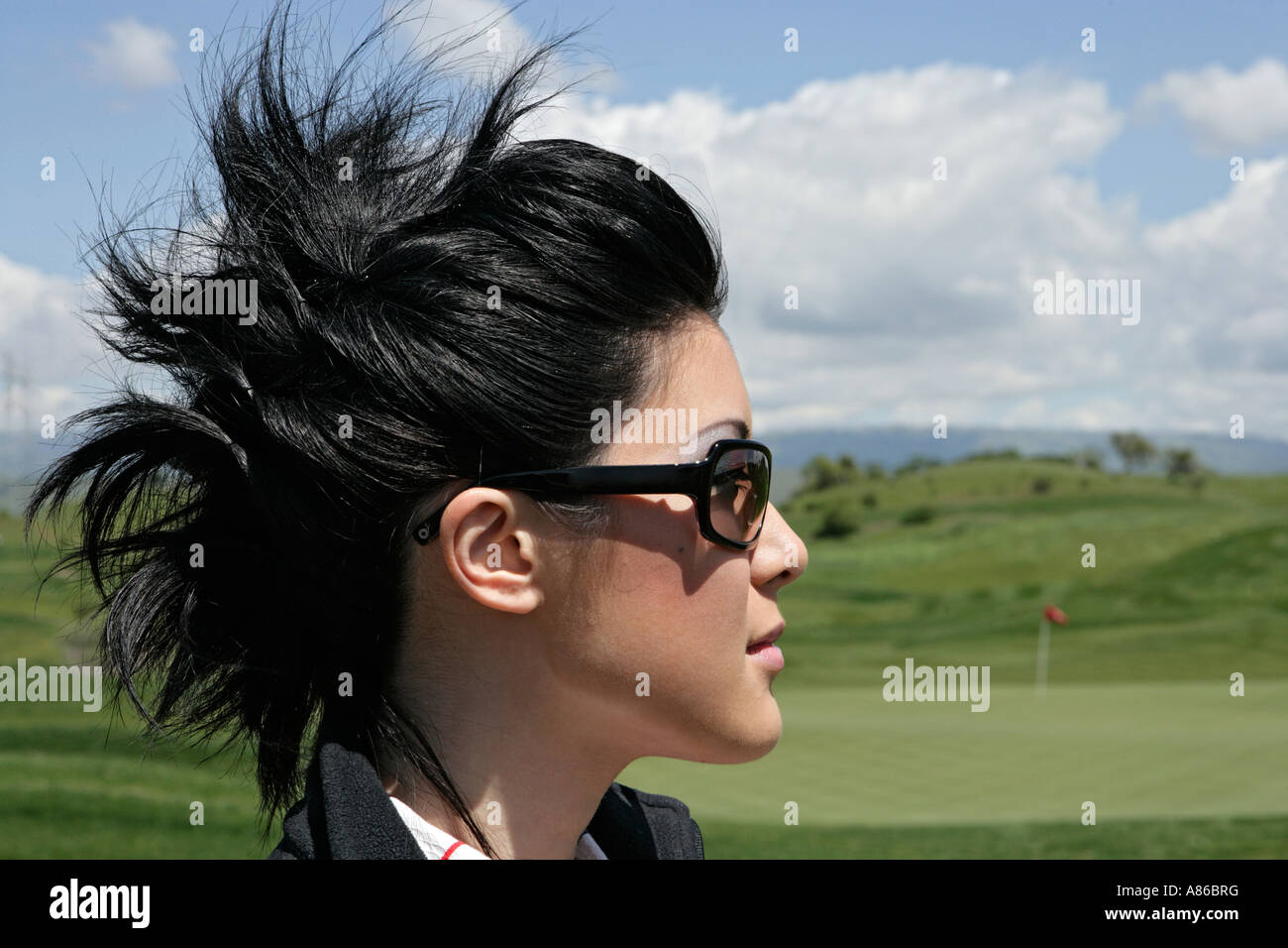 Side profile of a young woman Stock Photo - Alamy