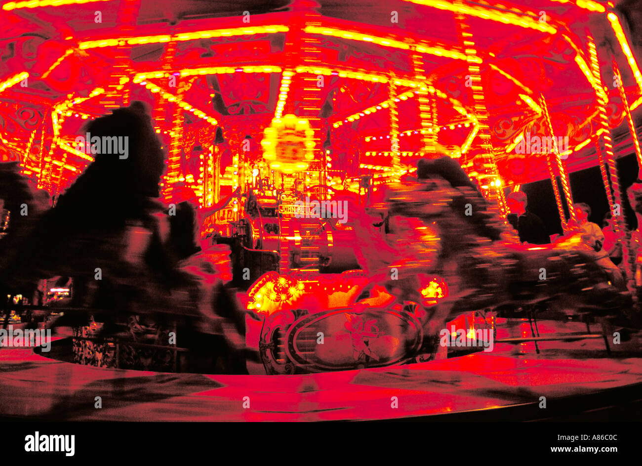 Fairground Roundabout at night Stock Photo - Alamy