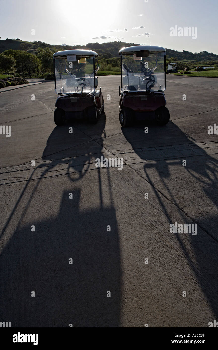 View of two golf carts Stock Photo - Alamy