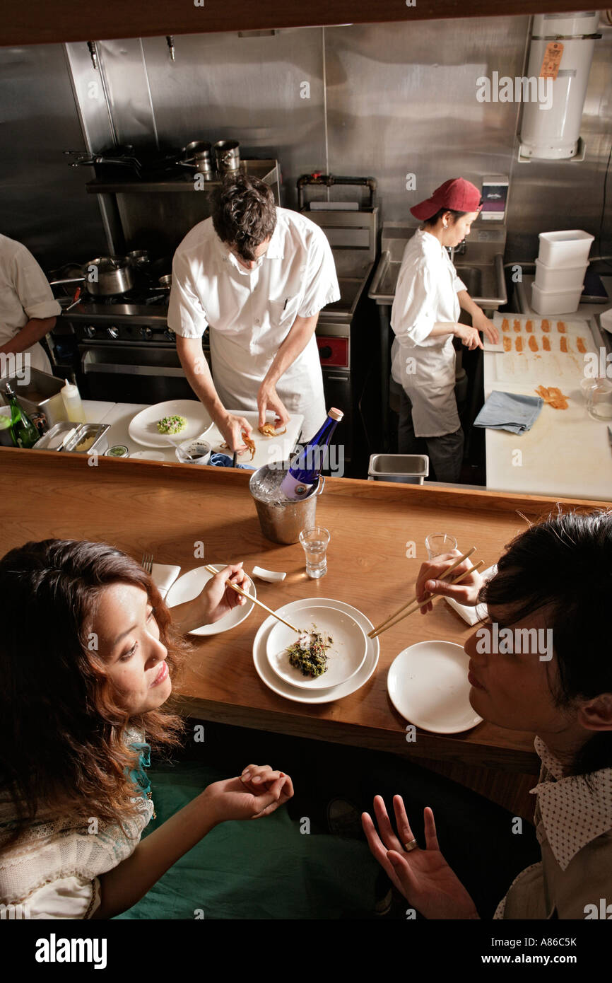 Young couple eating, aerial view Stock Photo - Alamy