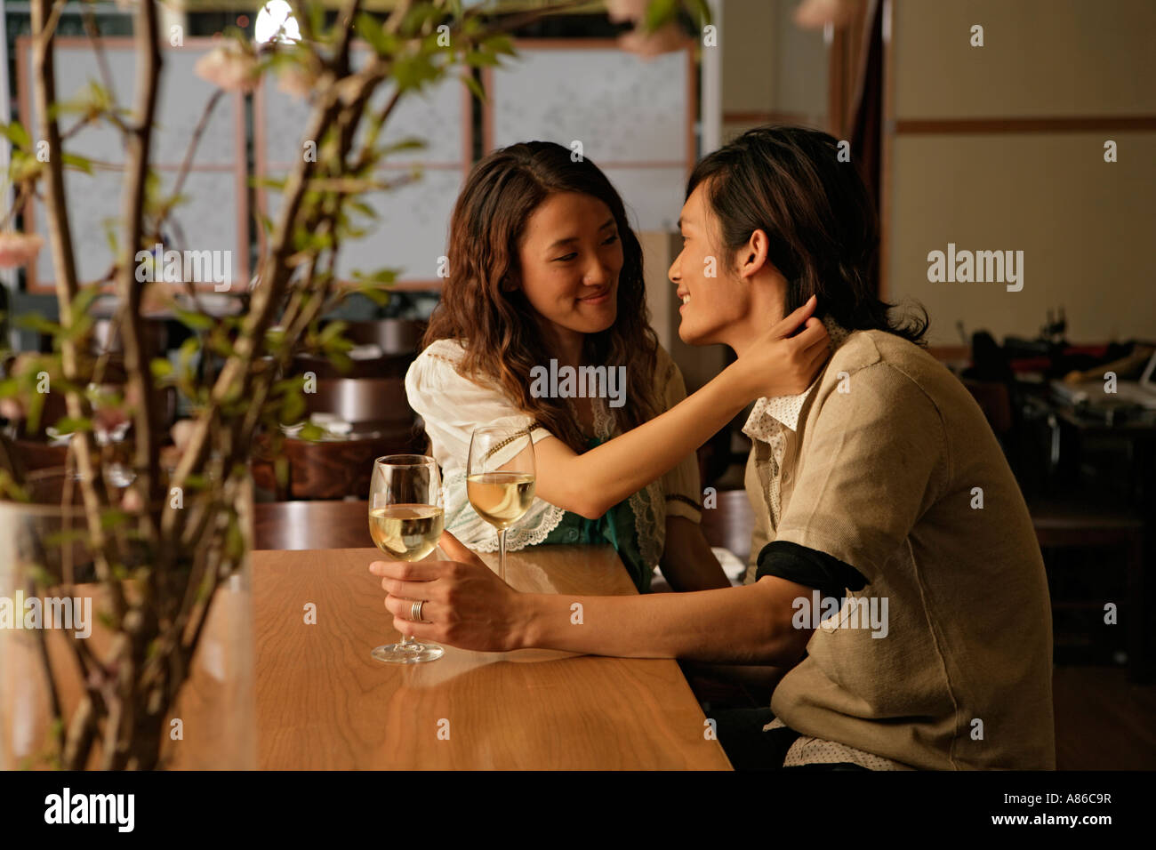 Young couple, side view Stock Photo - Alamy
