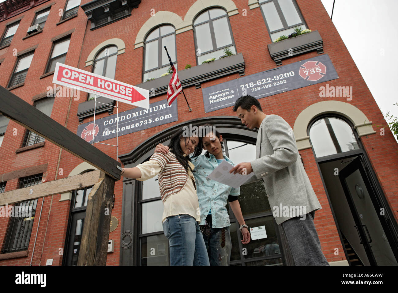 Young Couple Attending an Open House Stock Photo - Alamy