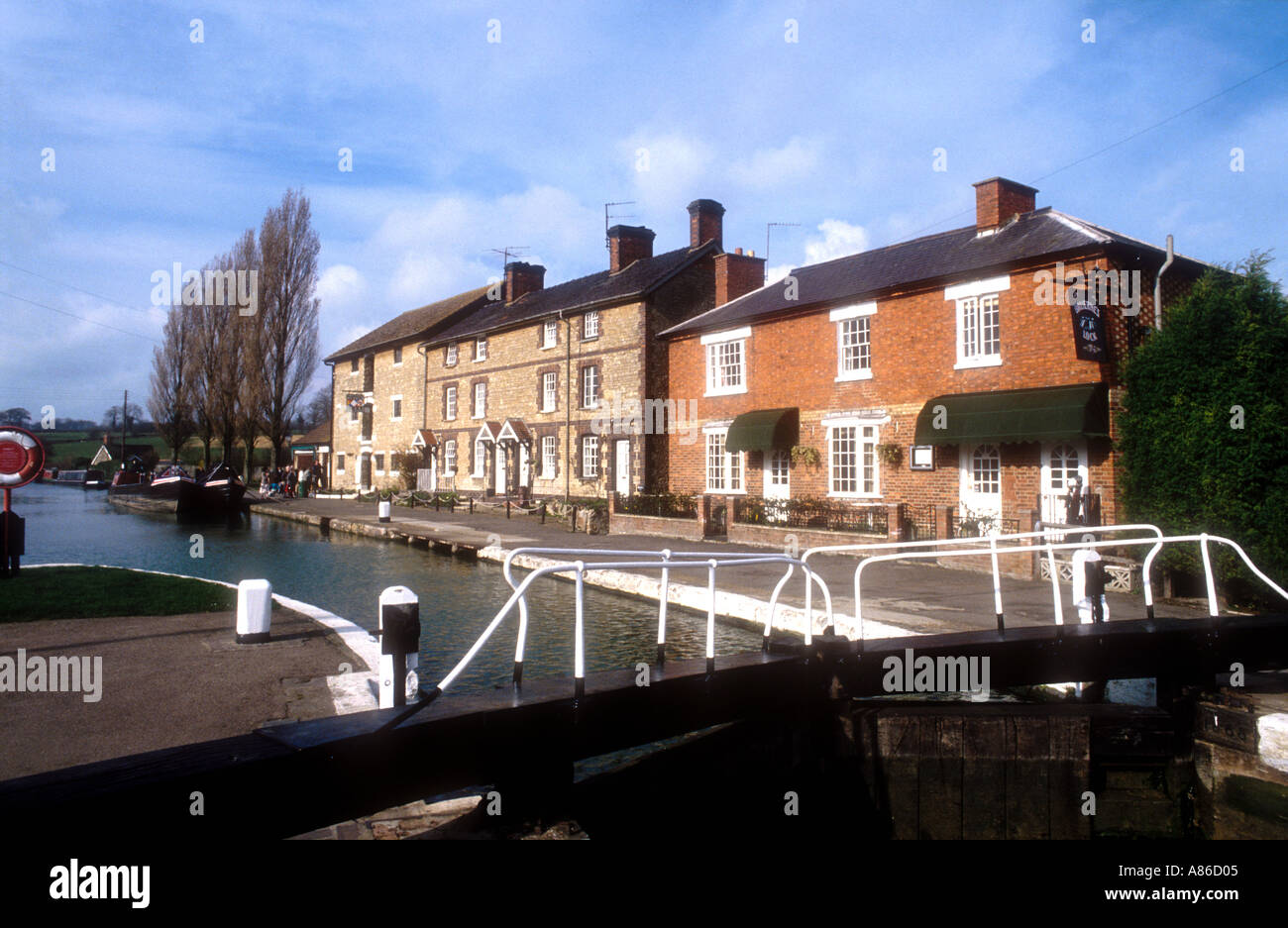 The lock and wharf on the Grand Union Canal at Stoke Bruerne ...