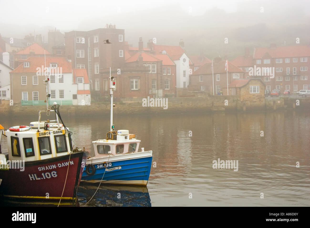Whitby harbour on a foggy day Stock Photo - Alamy