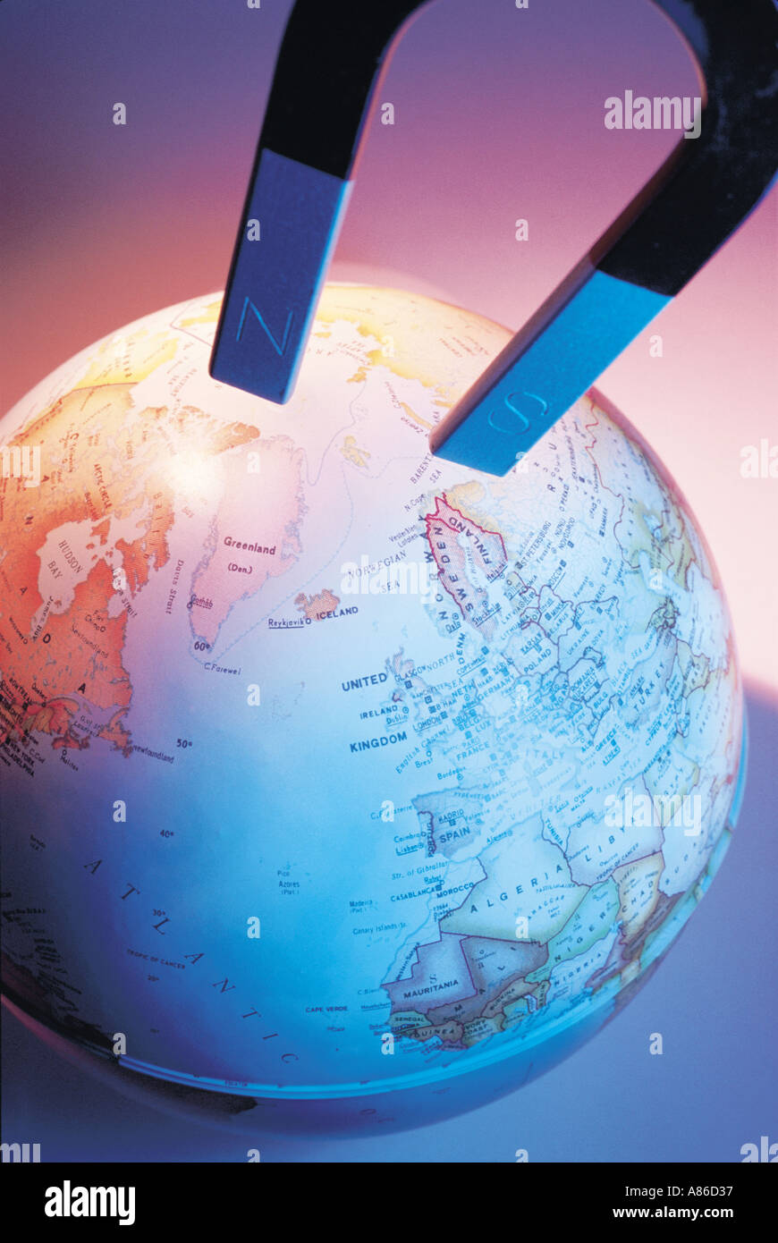 Magnet and Globe Stock Photo - Alamy