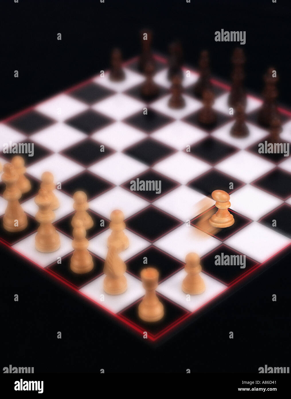 CHESS BOARD WITH PAWN MAKING FIRST MOVE SHOWING MOTION BLUR Stock Photo ...