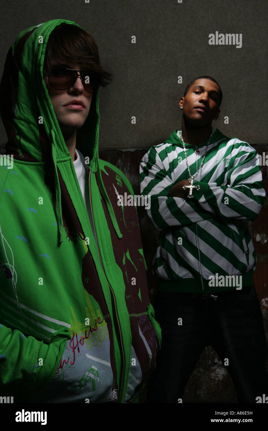 2 men males standing side by side hi-res stock photography and images ...