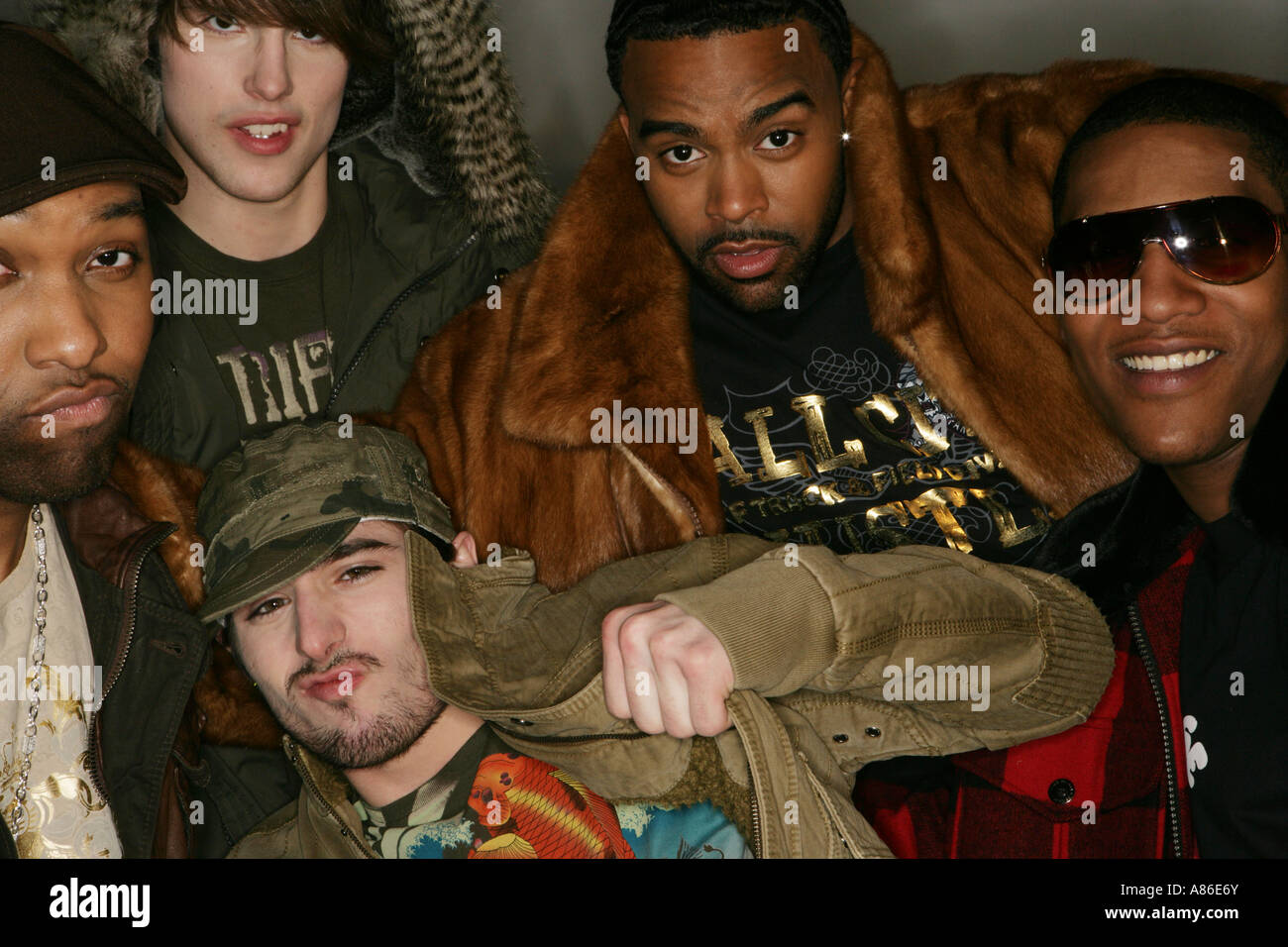 Group of men smiling at camera Stock Photo - Alamy