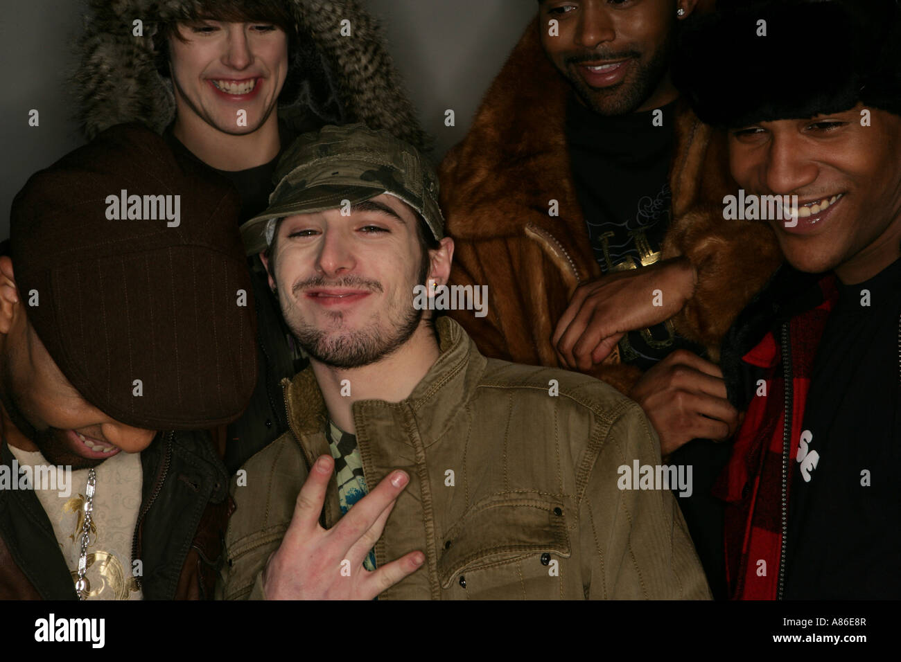 Group of four young men Stock Photo - Alamy