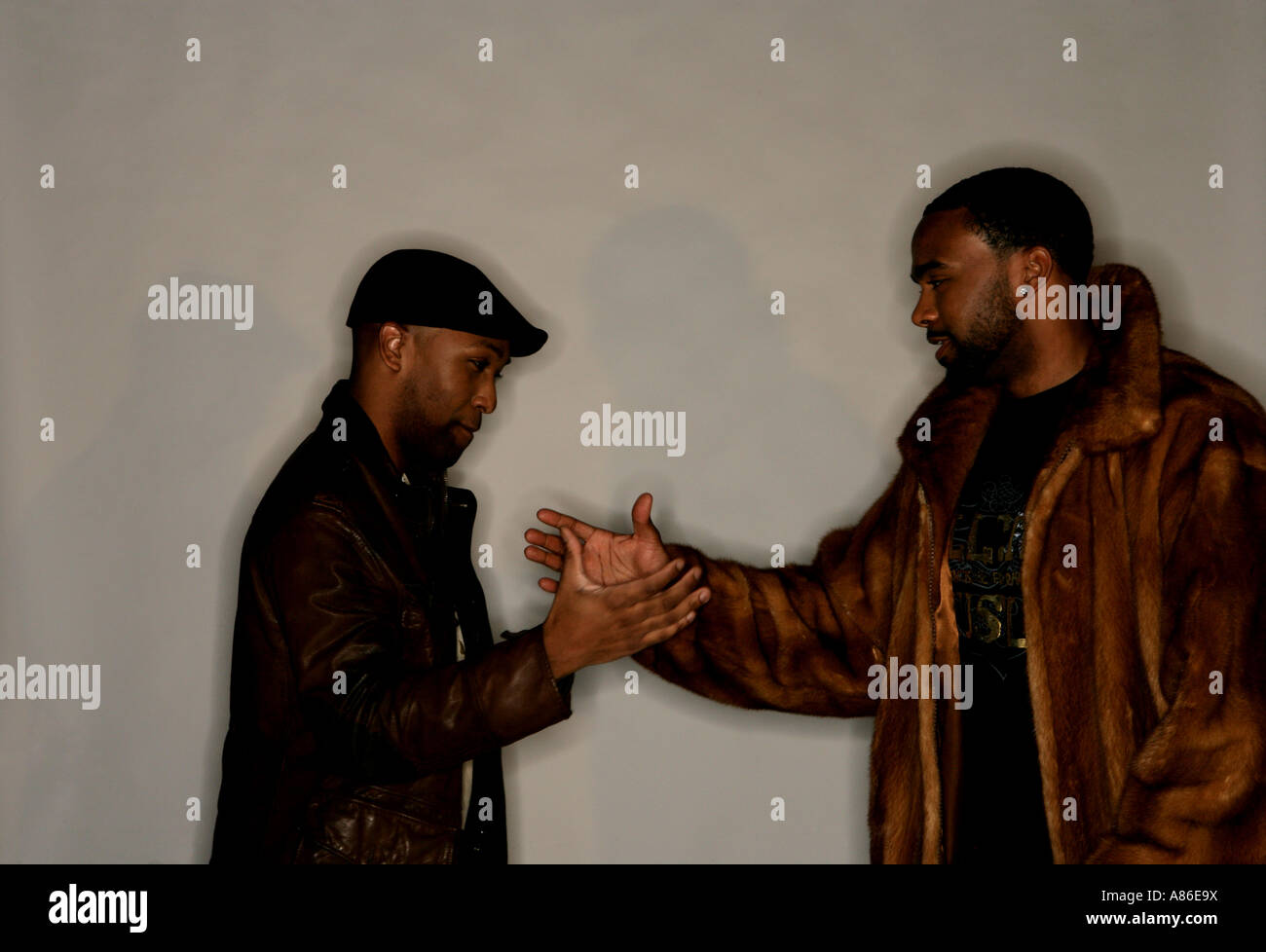 Two African-American meeting greeting each other Stock Photo - Alamy