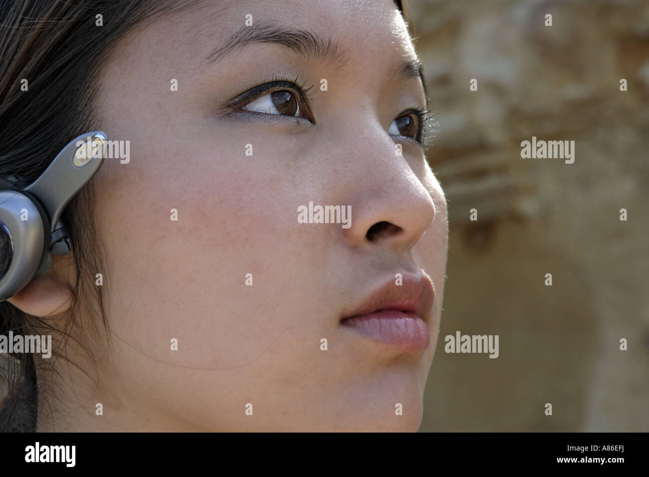 Portrait of a woman with blue tooth Stock Photo - Alamy
