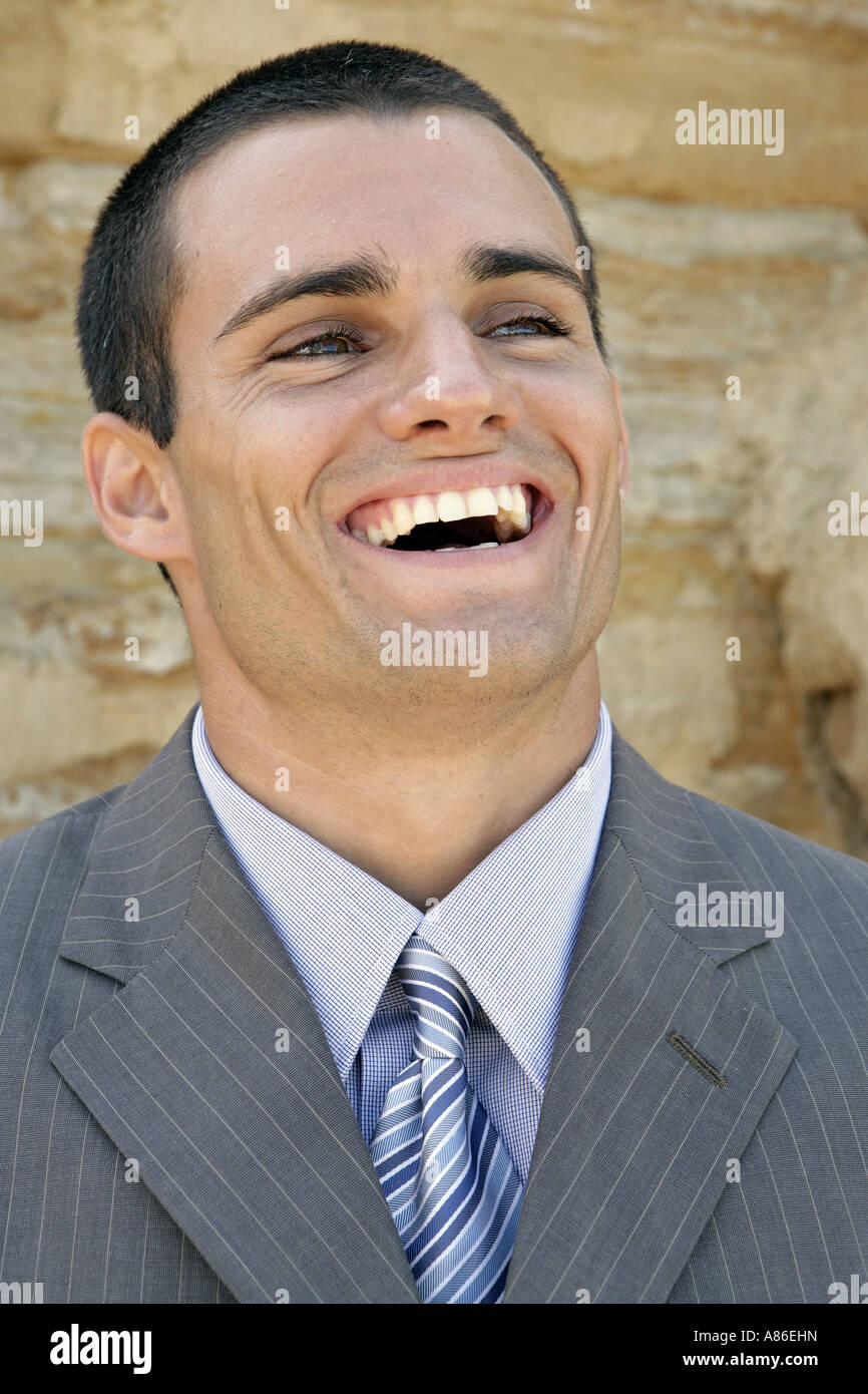 Portrait of a man laughing Stock Photo - Alamy