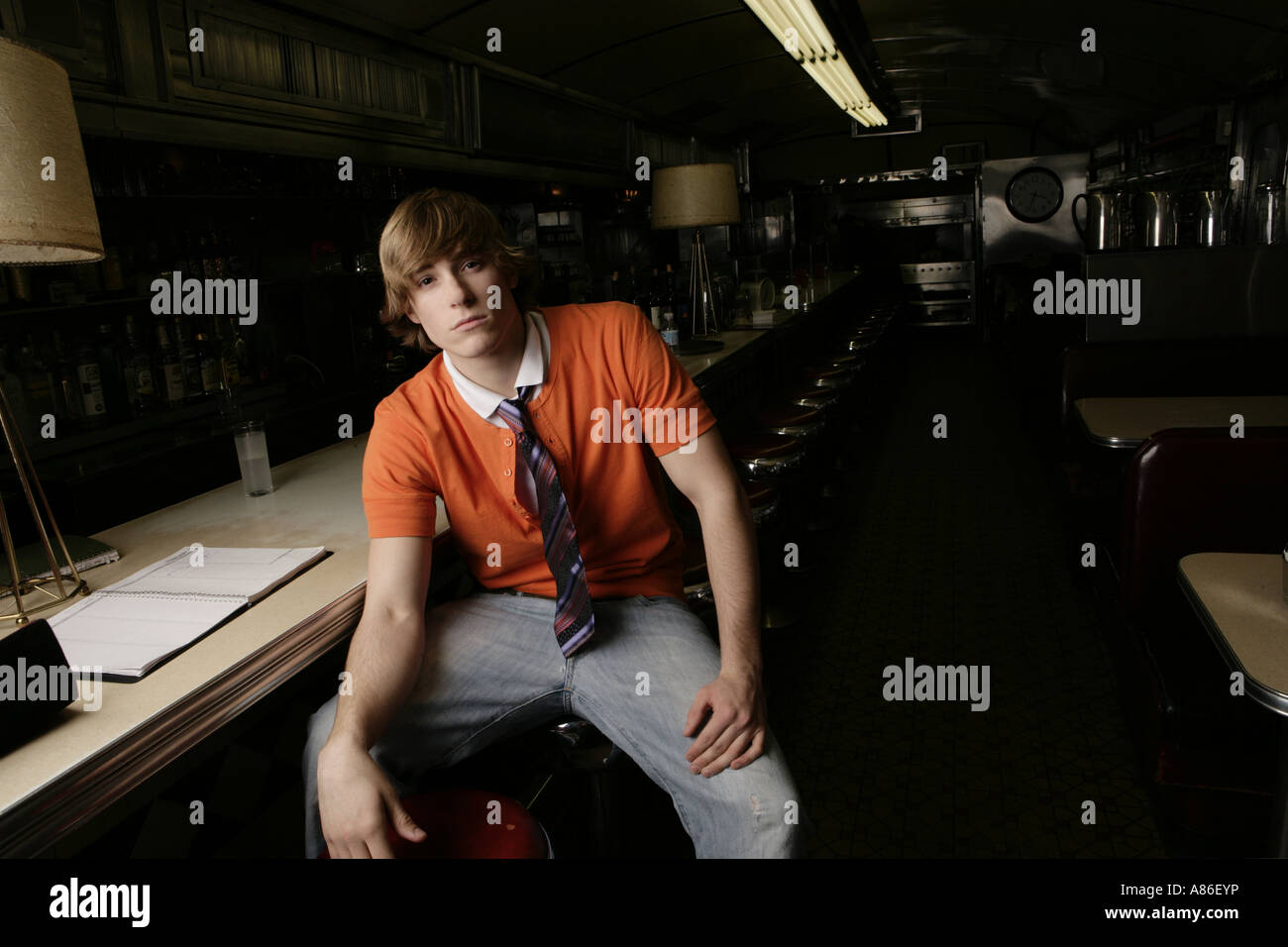 Young man in restaurant, portrait Stock Photo - Alamy