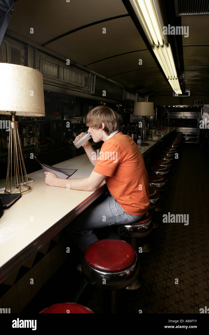 Young man in restaurant, portrait Stock Photo - Alamy