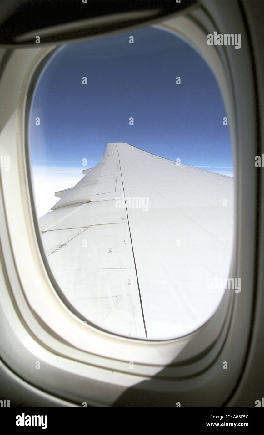 View from cabin through window of international airliner over Atlantic ...