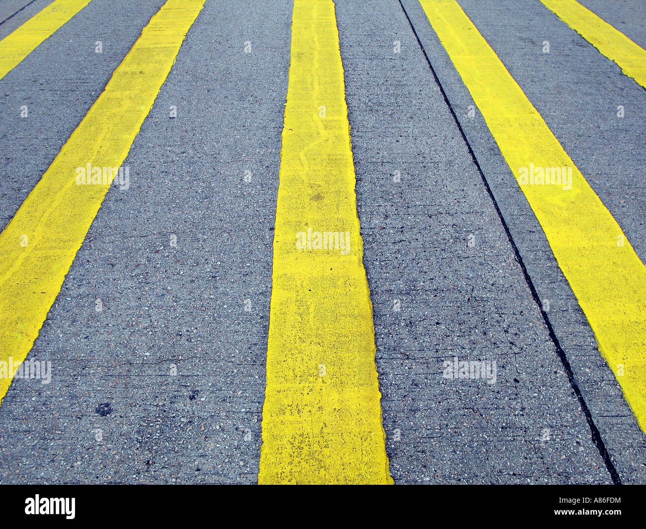 Yellow lines on pedestrian crossing Stock Photo - Alamy