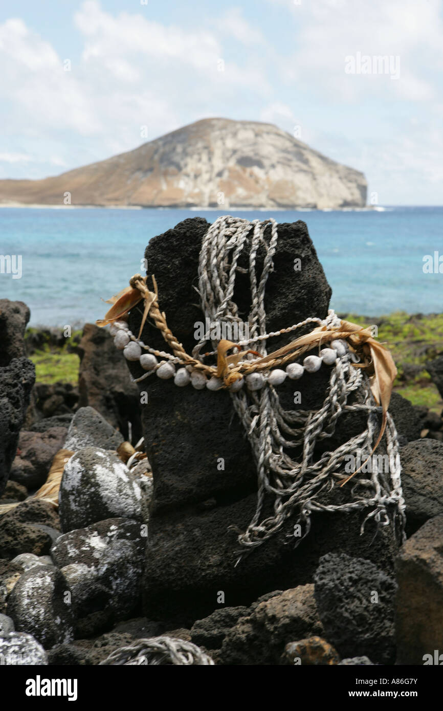 View of ropes bound around a rock Stock Photo - Alamy