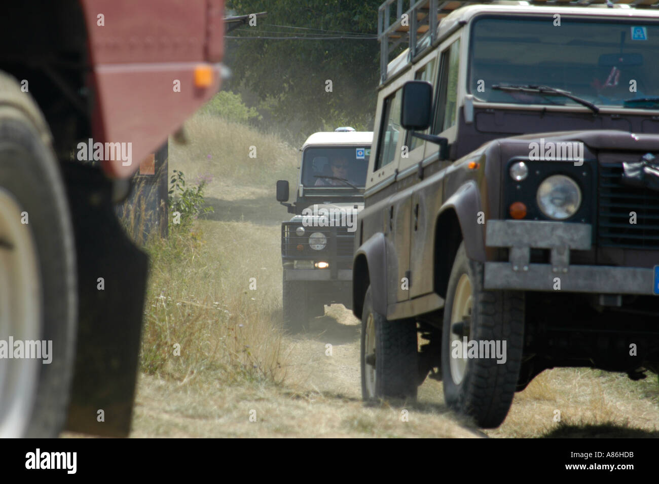 Four wheel drive Land Rovers off roading Stock Photo - Alamy