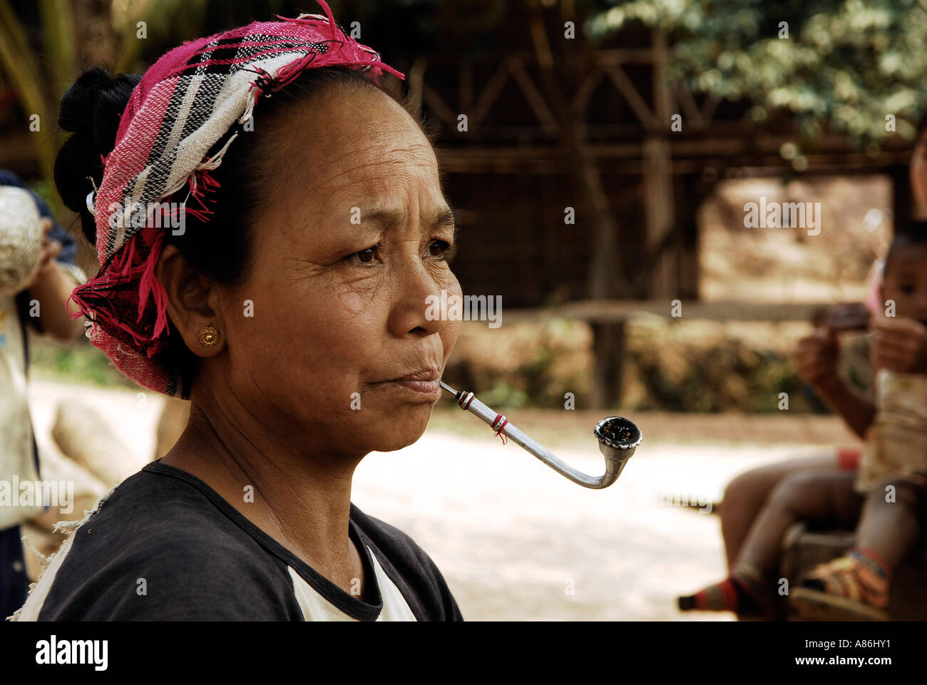 Thai Daeng Woman smoking pipe Luang Nam Tha Province Northern Laos ...