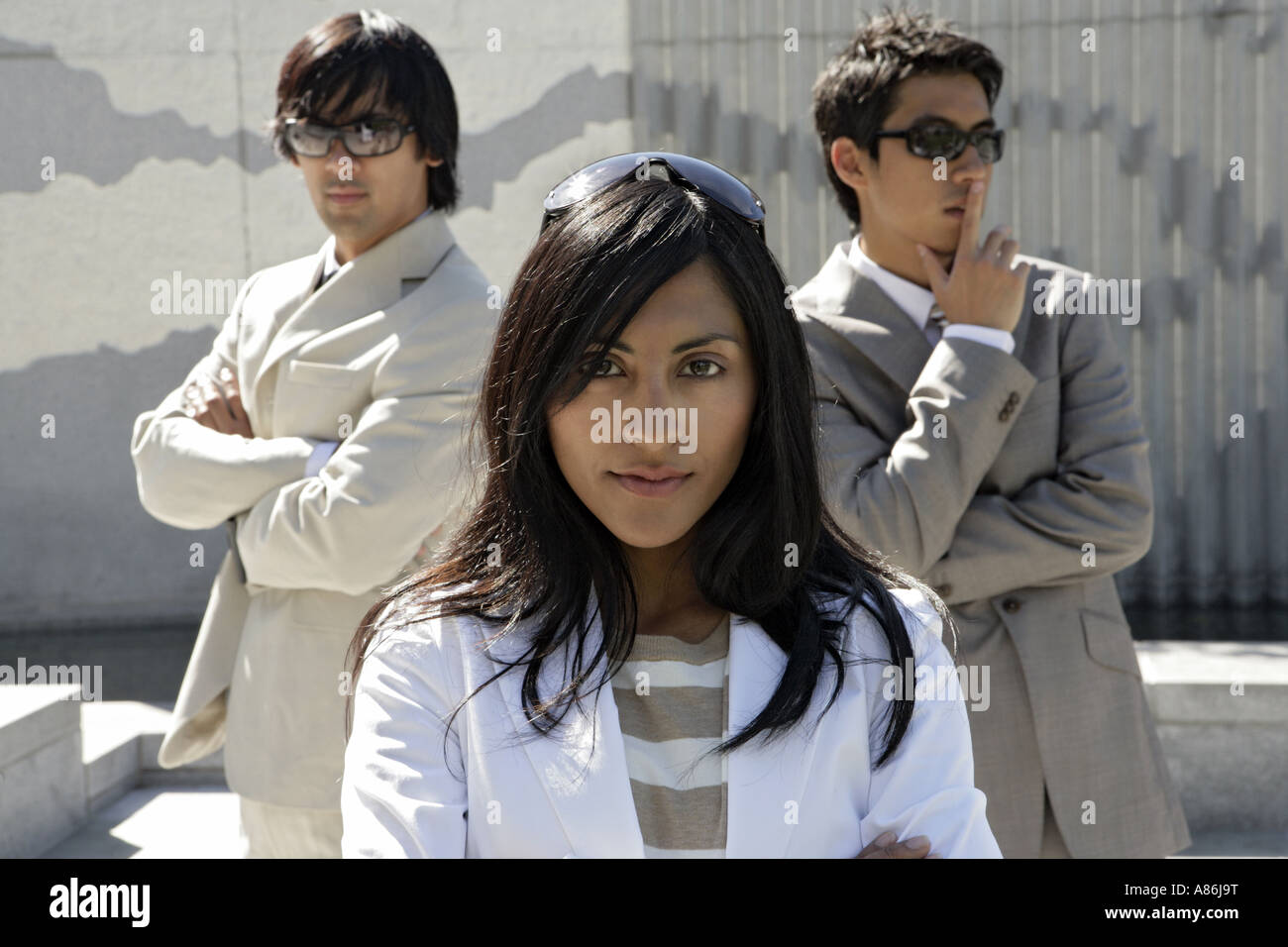 Three executives in a formal attire Stock Photo - Alamy