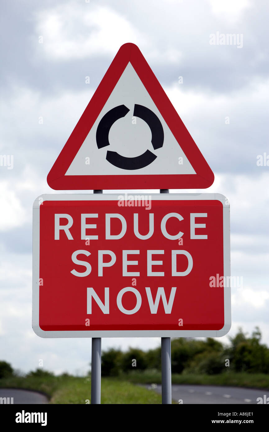 Reduce speed road signs hi-res stock photography and images - Alamy