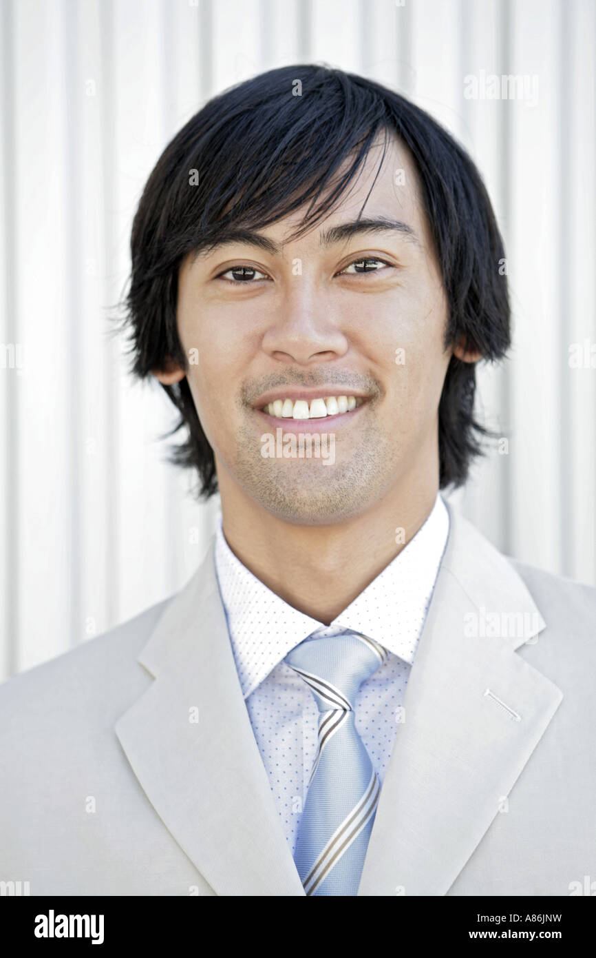 Portrait of an executive smiling for the camera Stock Photo - Alamy