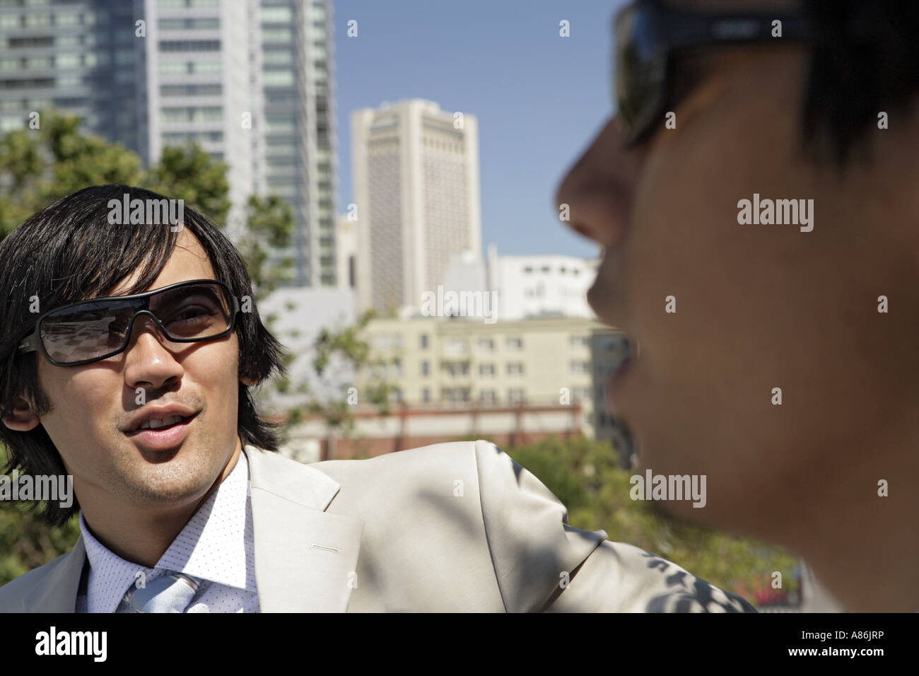Two men are conversing Stock Photo - Alamy