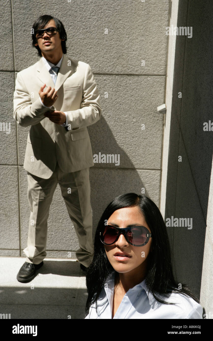 Two people looking at camera Stock Photo - Alamy