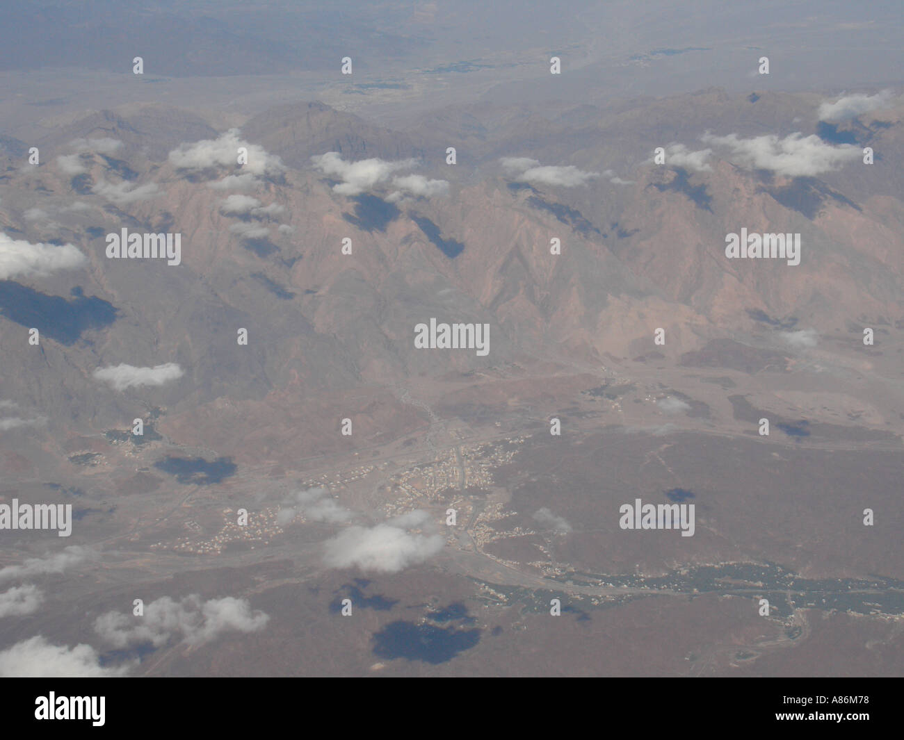 Aerial view of desert town and mountains in the north of Oman Stock ...