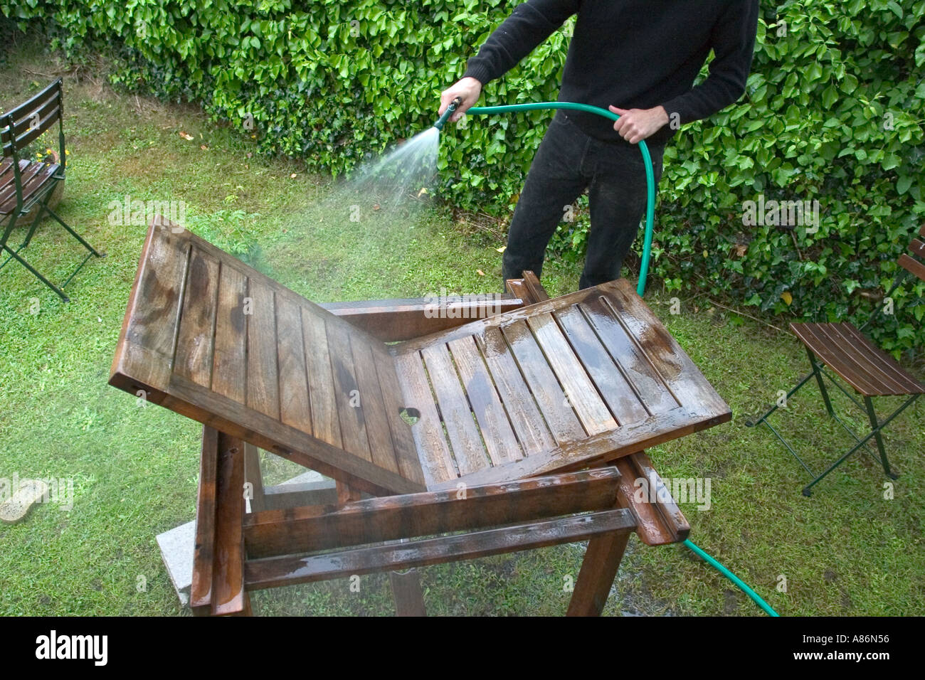 Spraying garden table hi-res stock photography and images - Alamy