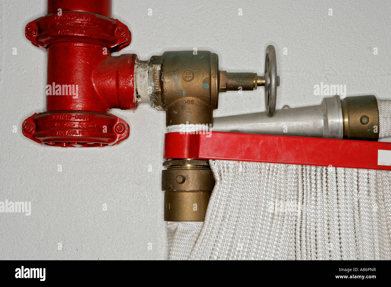 View of a section of a fire extinguisher Stock Photo - Alamy