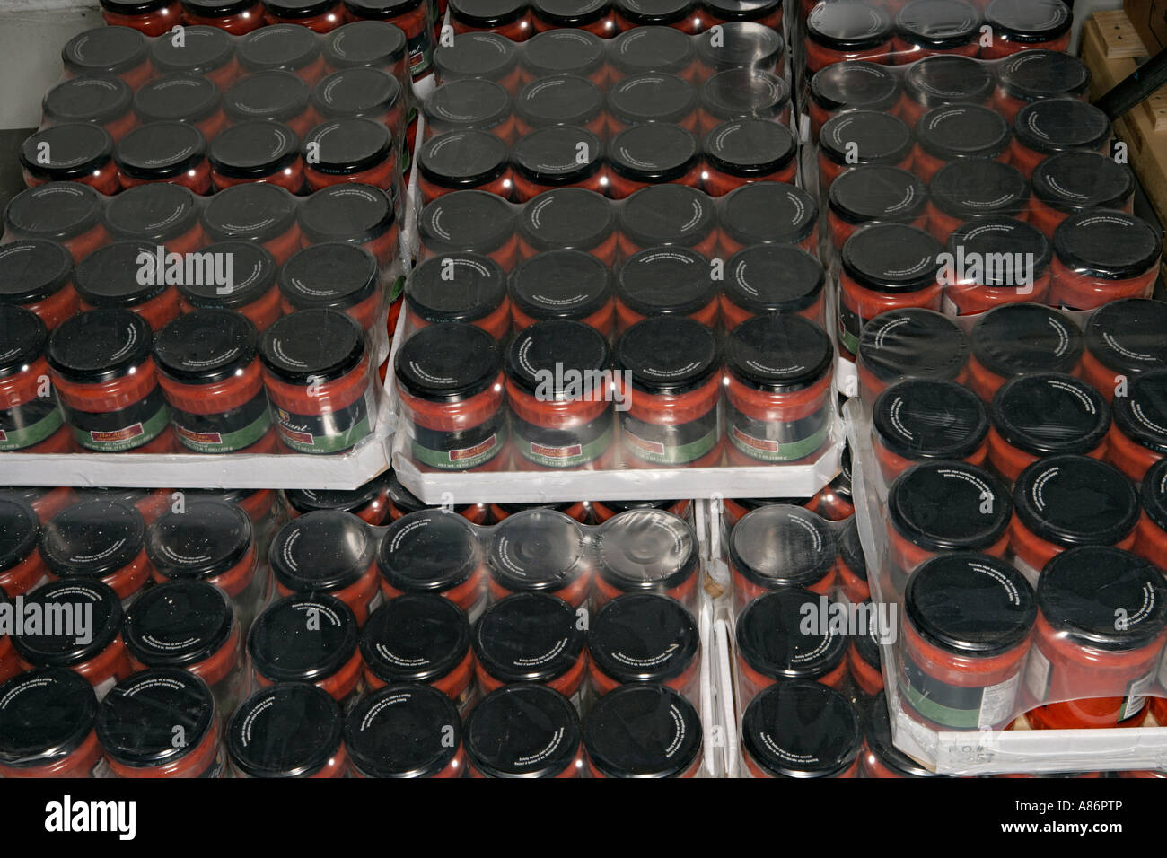 View of containers arranged on shelves Stock Photo - Alamy