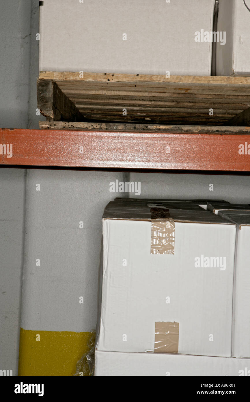 View of parcels boxes arranged on a rack Stock Photo - Alamy
