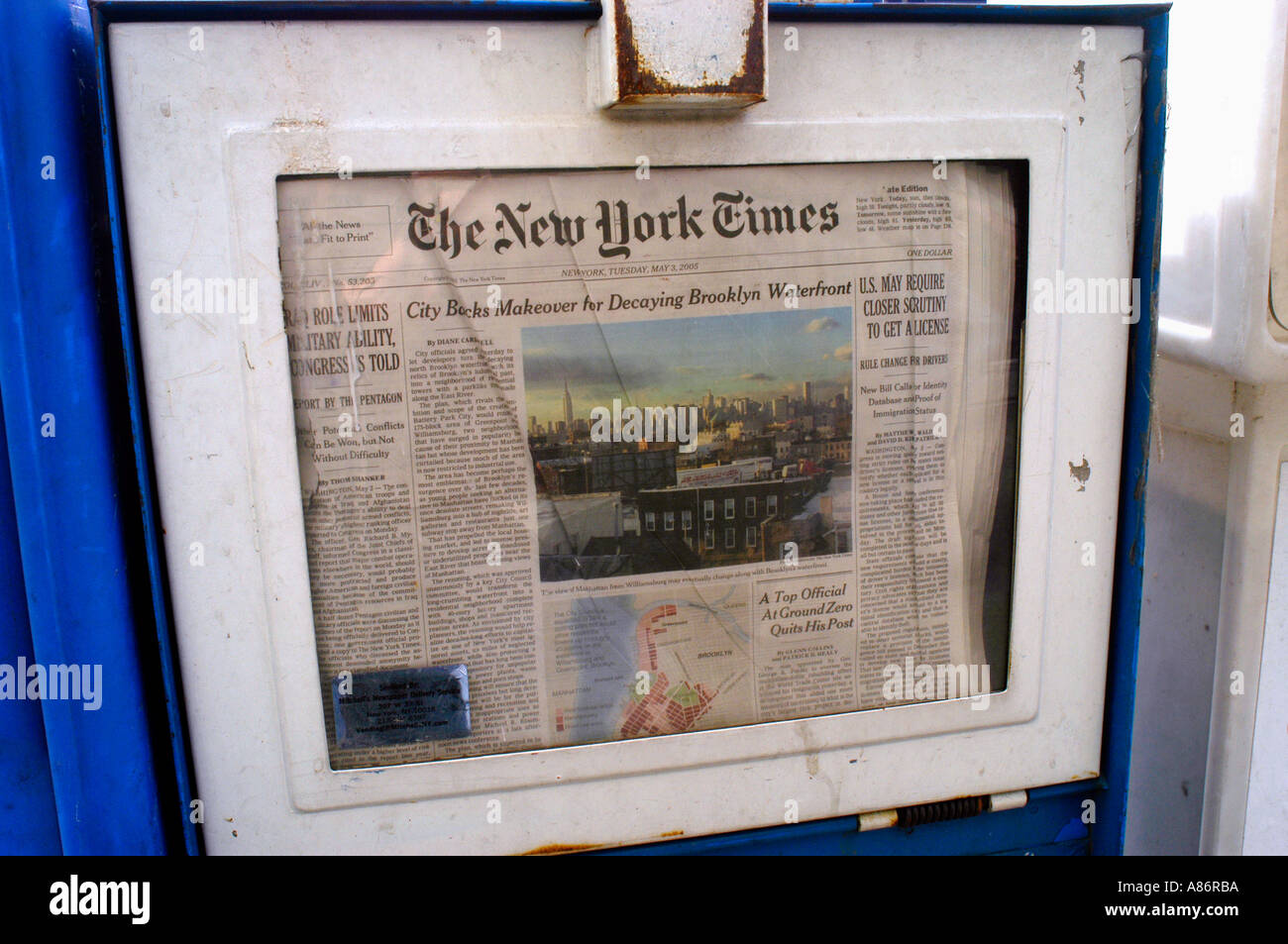 A copy of the New York Times being sold in a sidewalk newspaper box ...