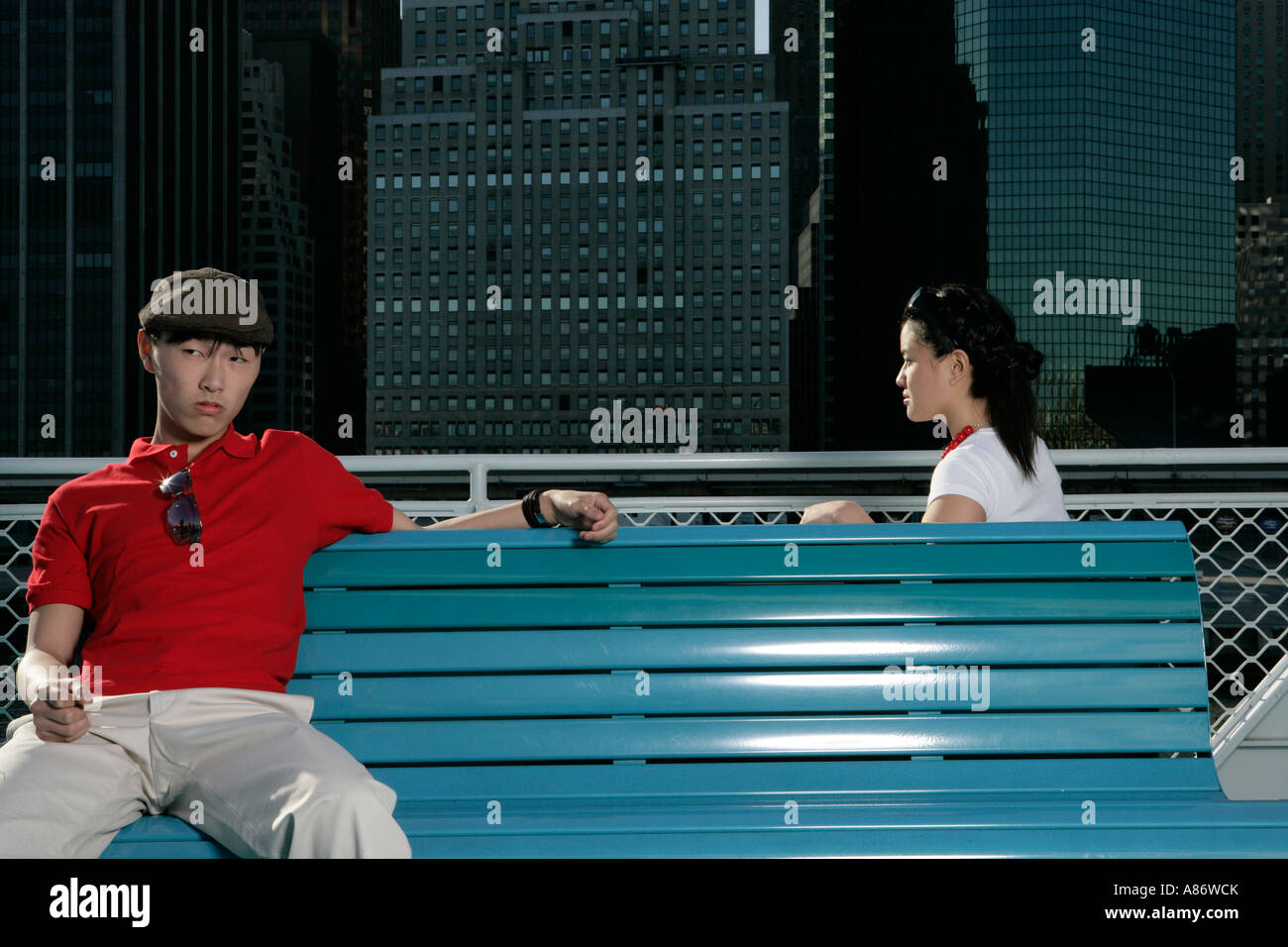 Women sitting on benches hi-res stock photography and images - Alamy