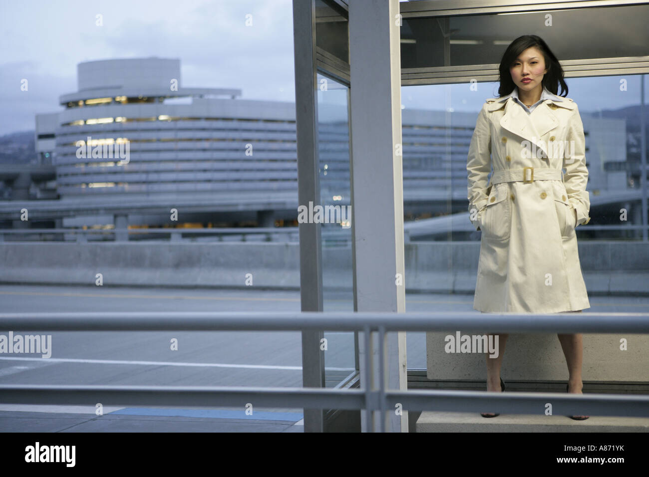 A woman stands on a bench Stock Photo - Alamy