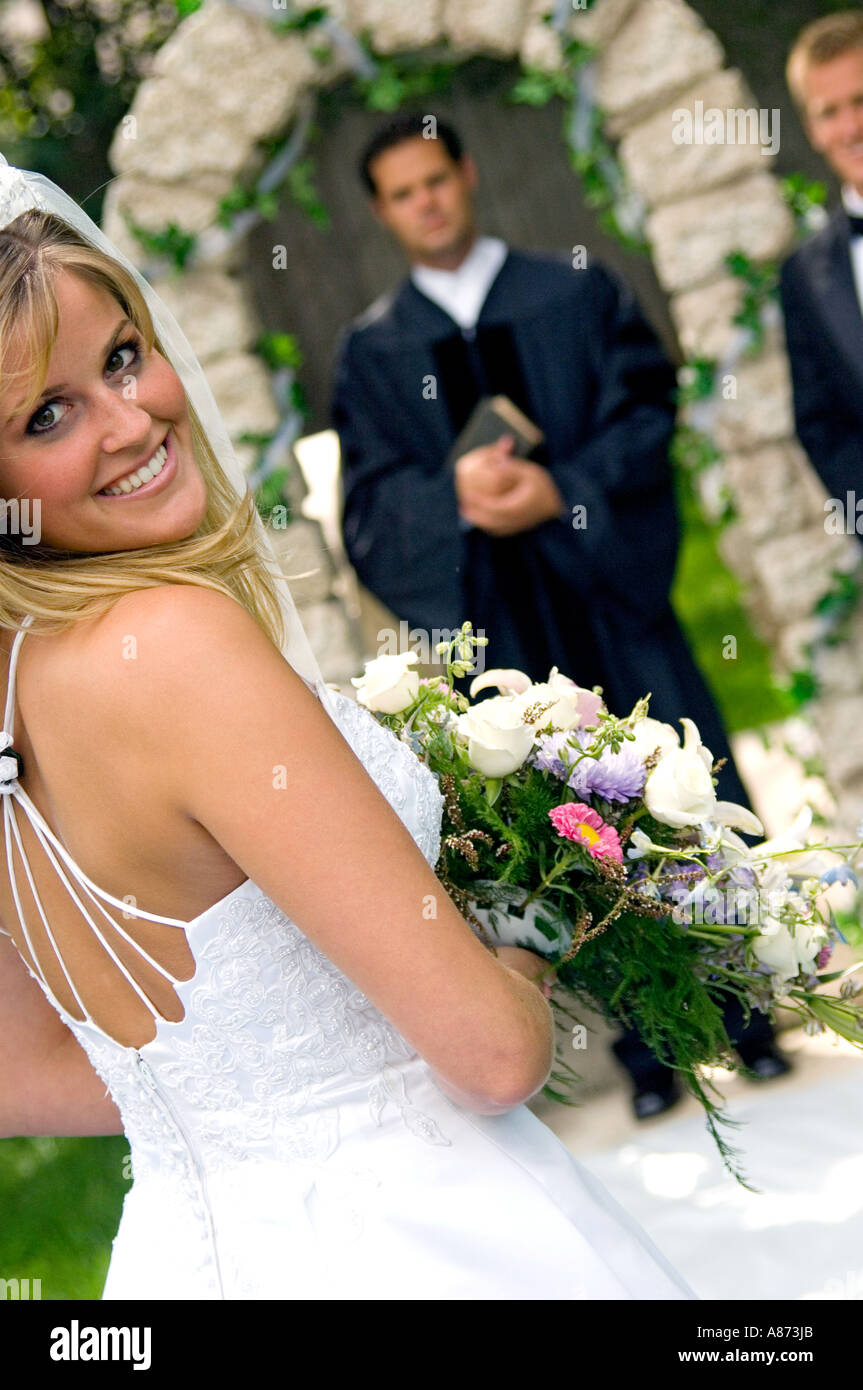 Bride walking down the aisle Stock Photo - Alamy