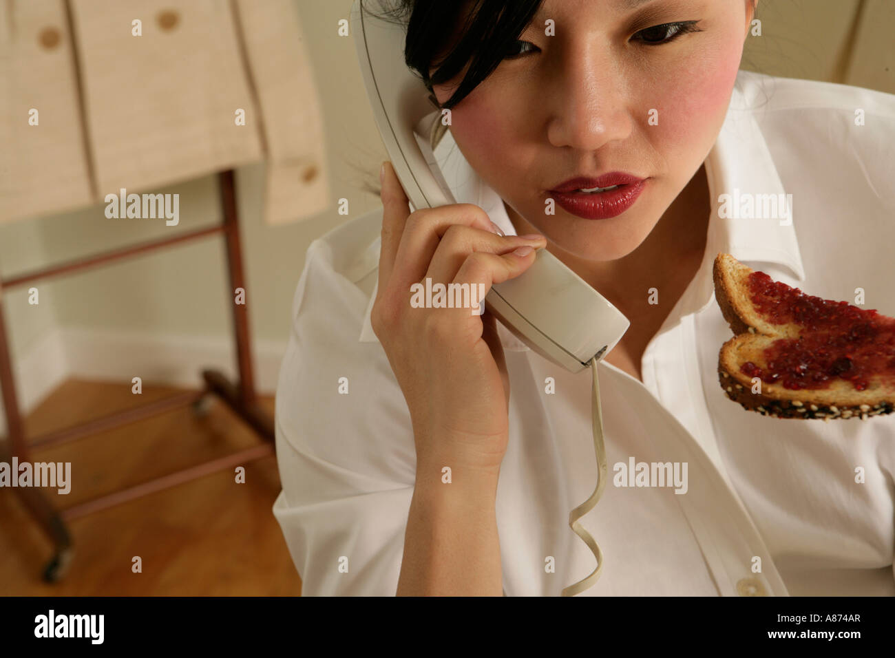 Woman over telephone, close-up Stock Photo - Alamy