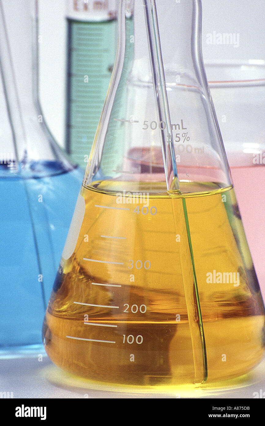 Beakers in a laboratory filled with colored liquid Stock Photo - Alamy