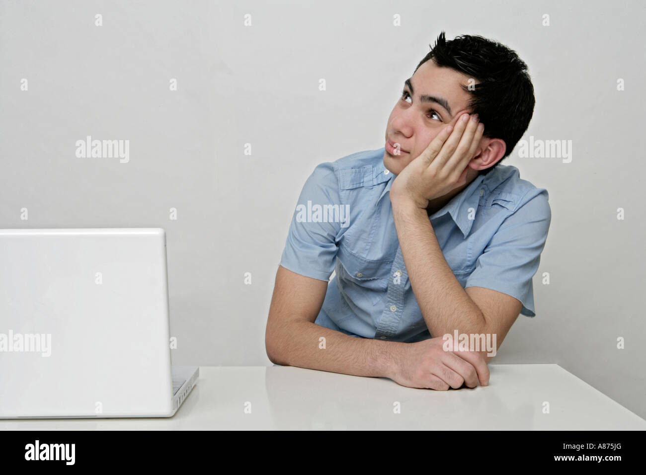 View of a boy thinking Stock Photo - Alamy