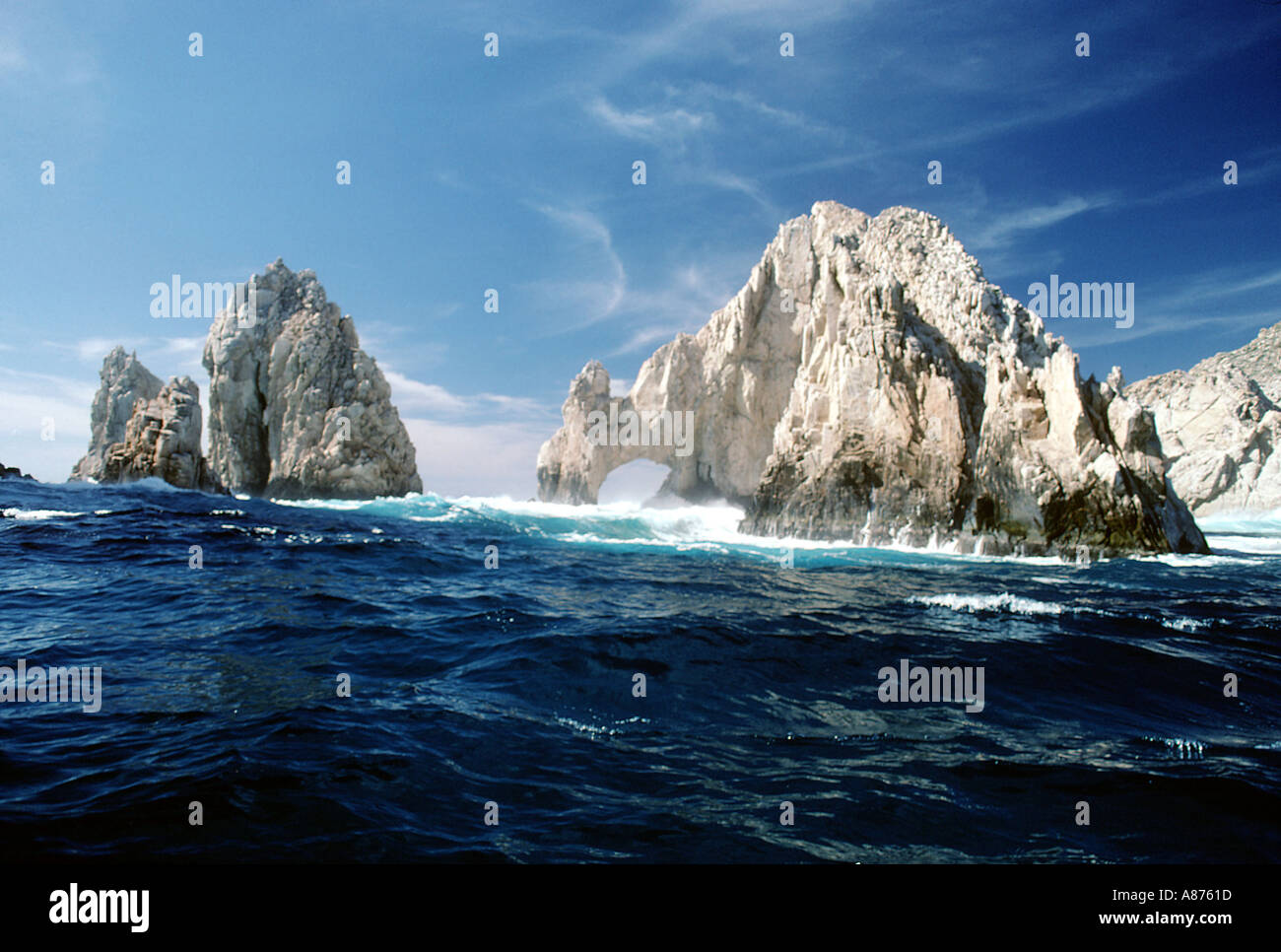 White capped rock formations carved by the sea on the ocean The water ...