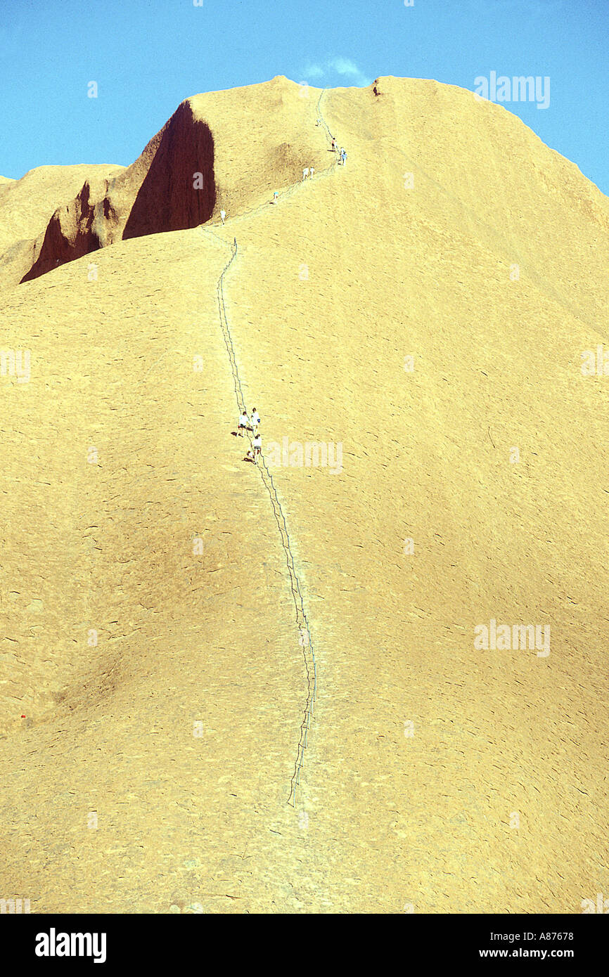 Australia outback climbing Ayers Rock Stock Photo - Alamy