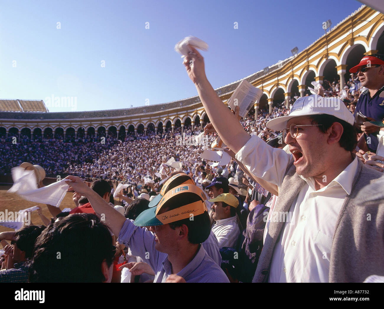 SPAIN Andalucia Seville Arenal District Bullring Crowd standing ...