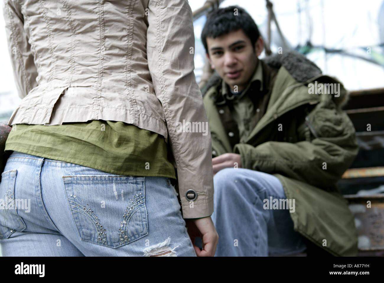 Man smiles looking camera sitting hi-res stock photography and images ...